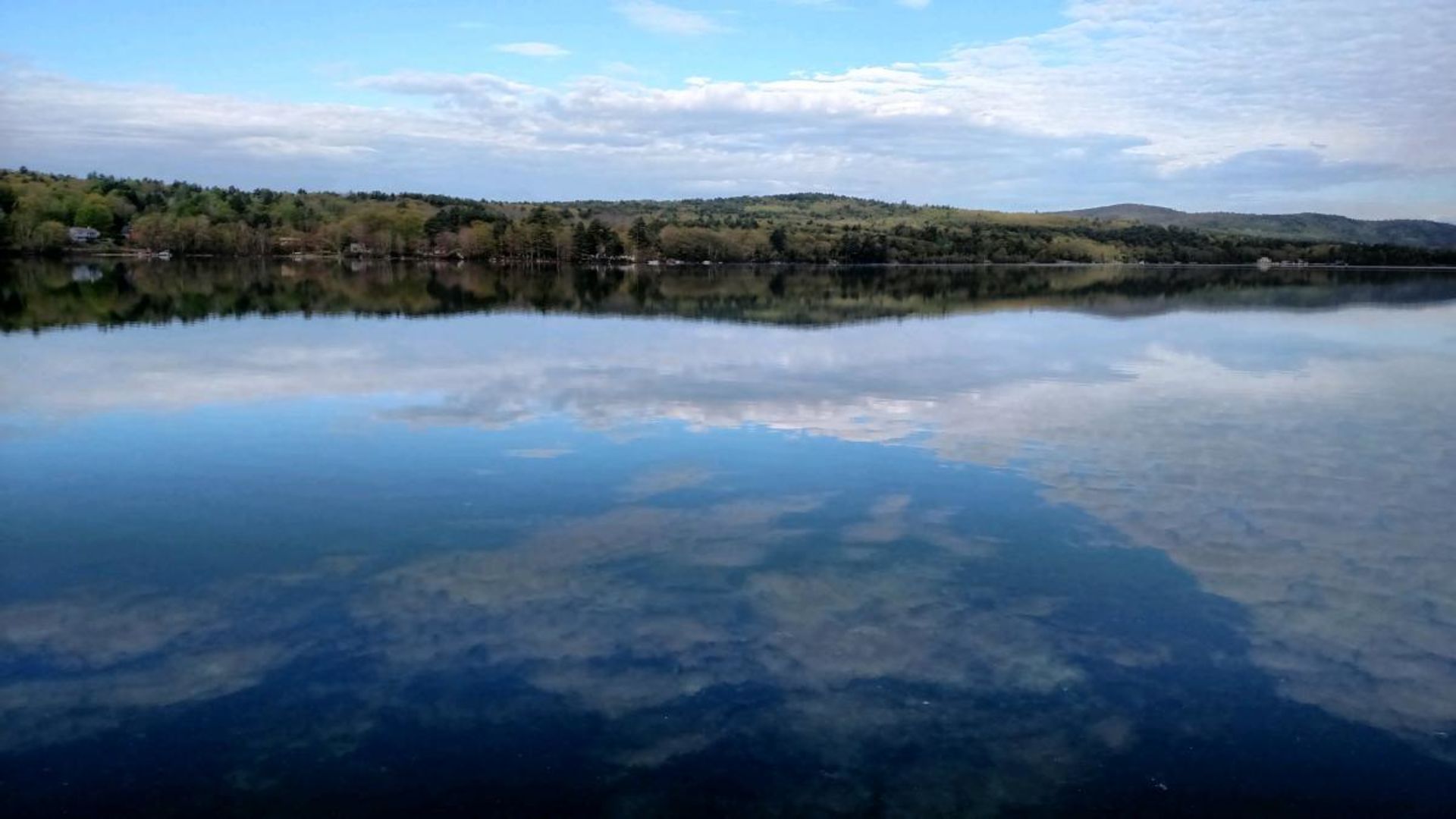Lake Waukewan NH - Distinctive, Luxury, and Island Homes